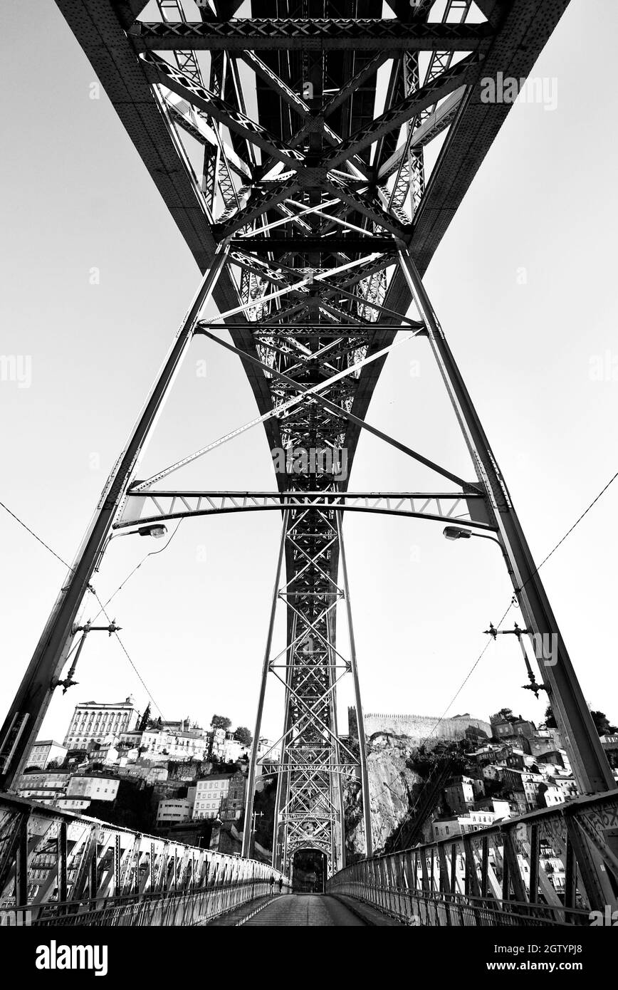 View below/underneath the Luís I Bridge, Porto, Portugal . The Dom Luís ...