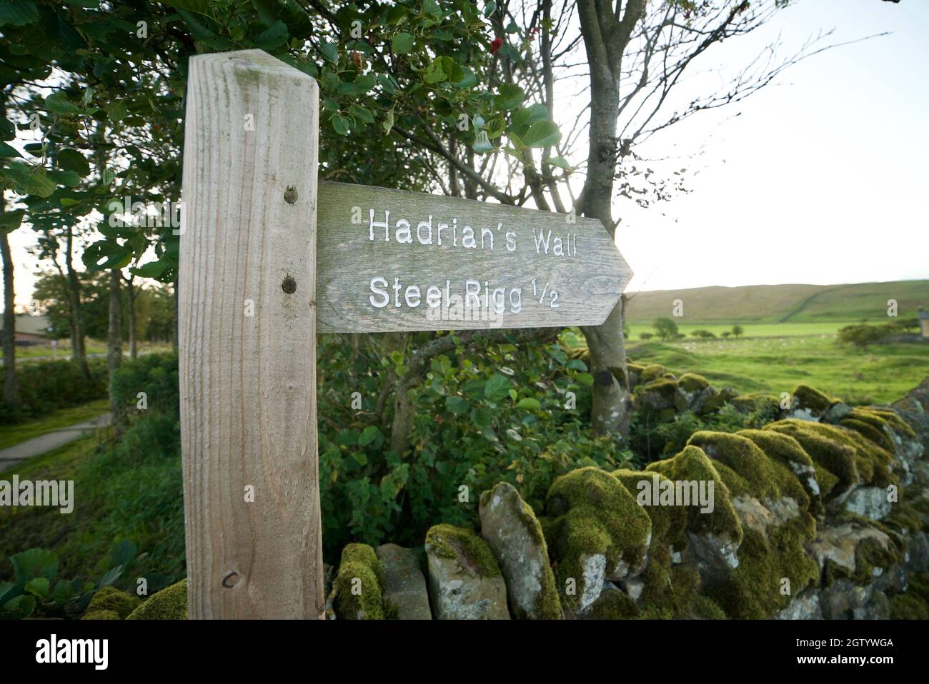 An English public footpath sign pointing to Hadrians Wall and Steel ...