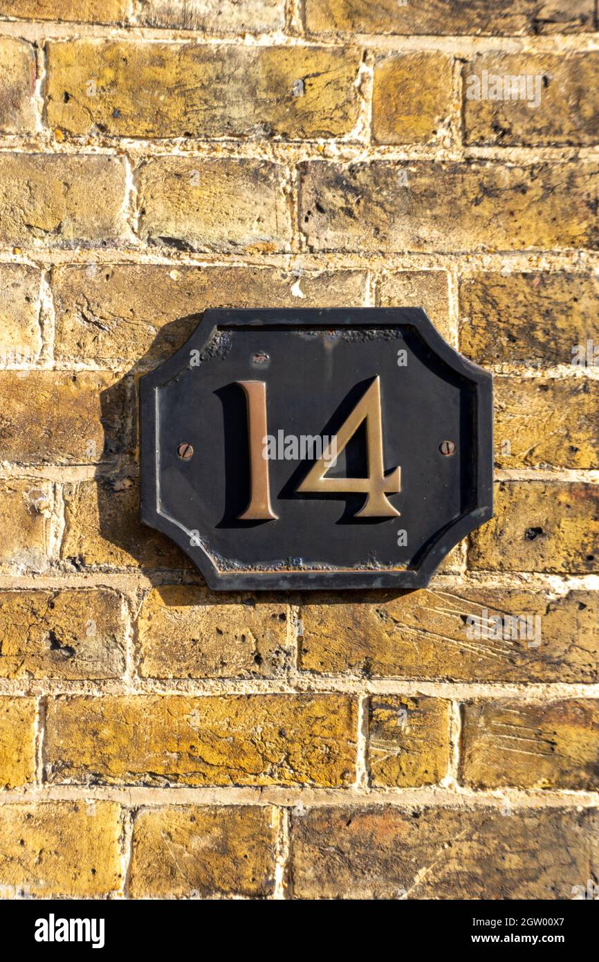 House Number 14 On A Brick Wall In London Stock Photo - Alamy