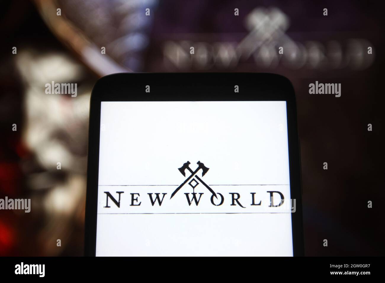 In this photo illustration a New World logo of a massively multiplayer ...