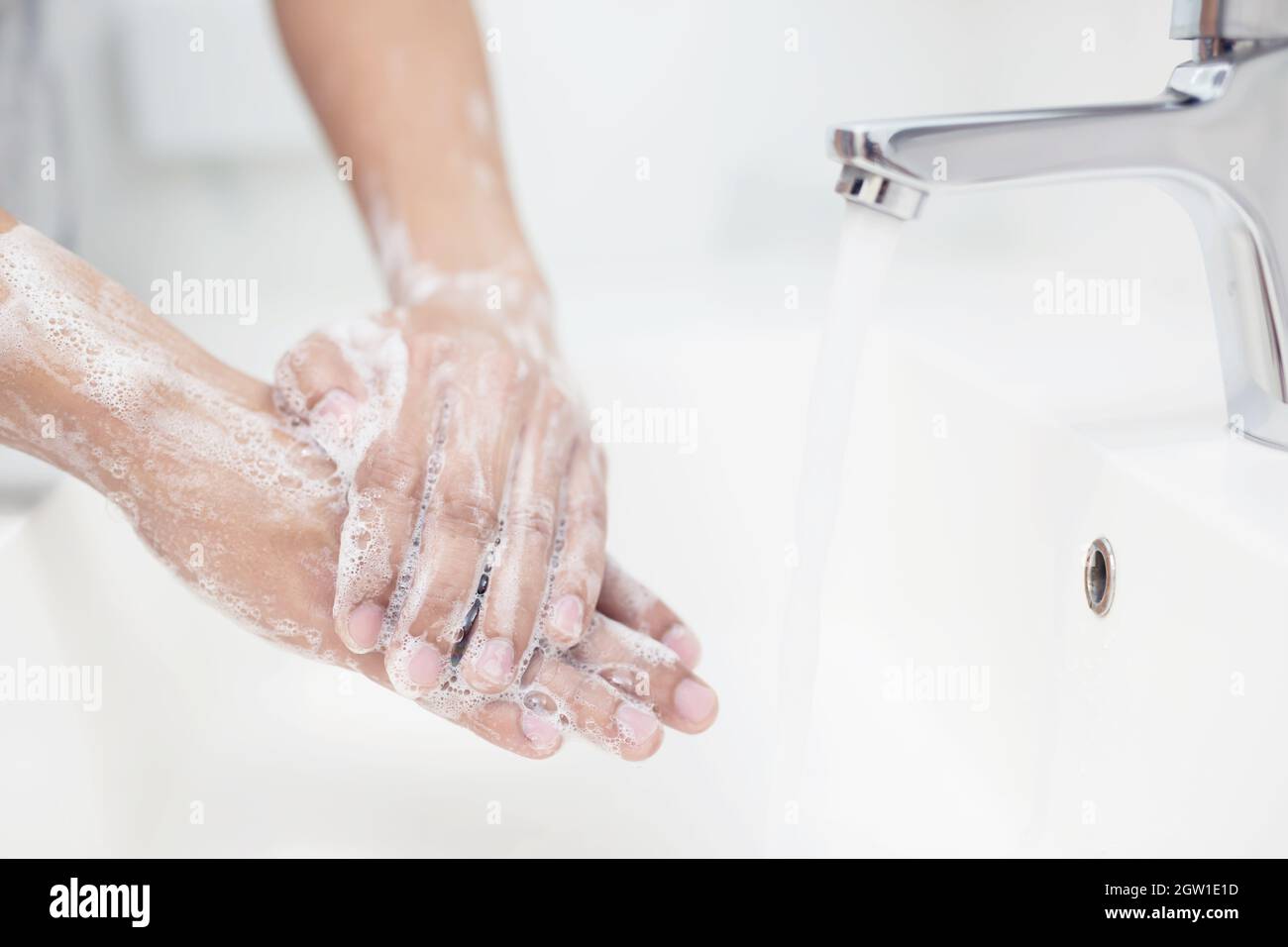 Washing hands before eating hi-res stock photography and images - Alamy