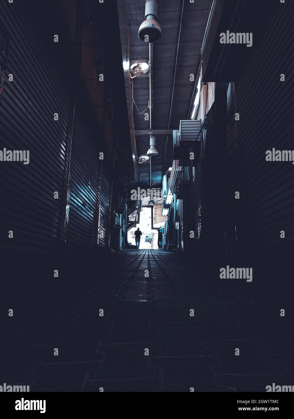 Empty Alley Amidst Buildings In City At Night Stock Photo - Alamy