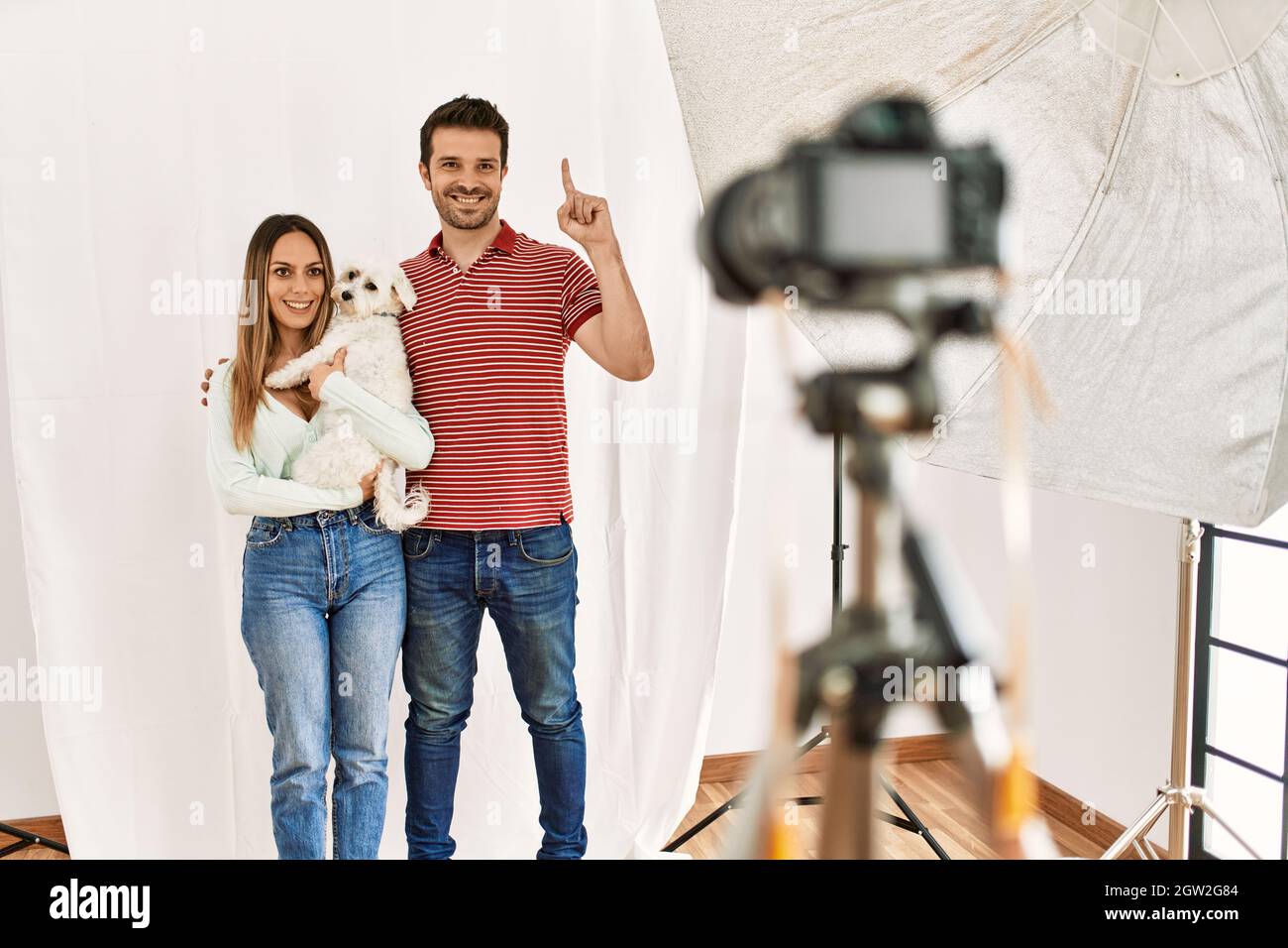 Couple of boyfriend and girlfriend with dog posing as model at ...