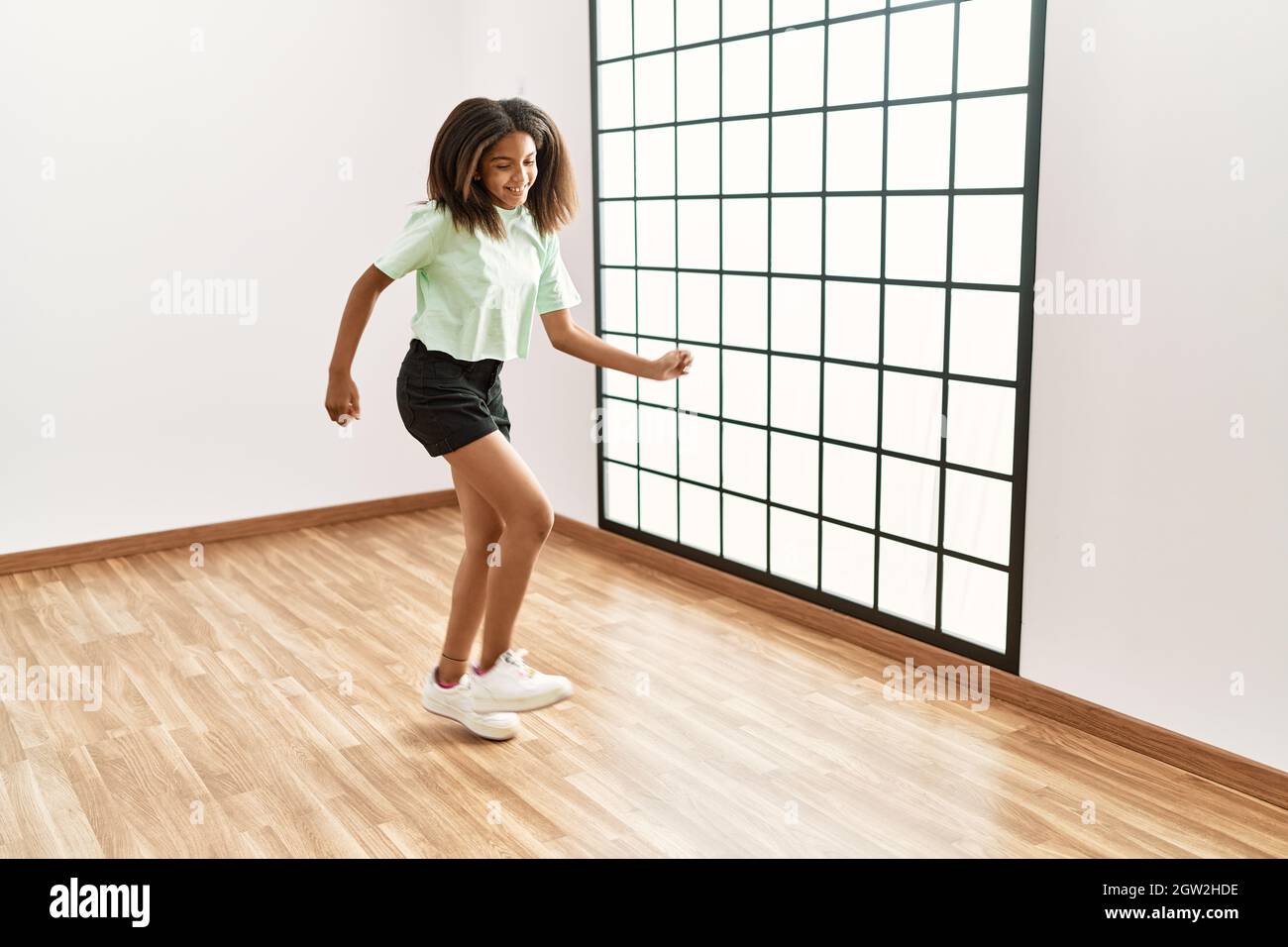 African american girl smiling confident dancing at dance school Stock ...