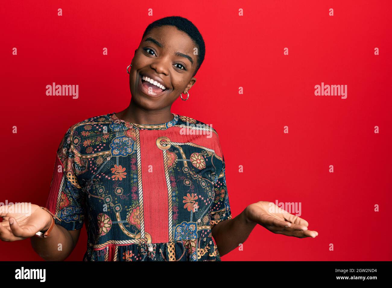 Young african american woman wearing african style clueless and ...
