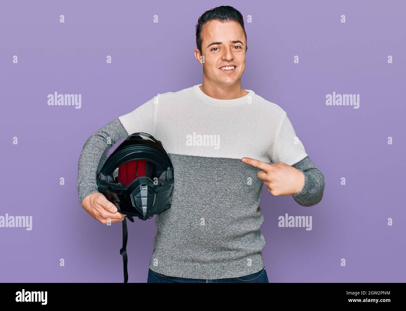 Man holding motorcycle helmet hi-res stock photography and images - Alamy