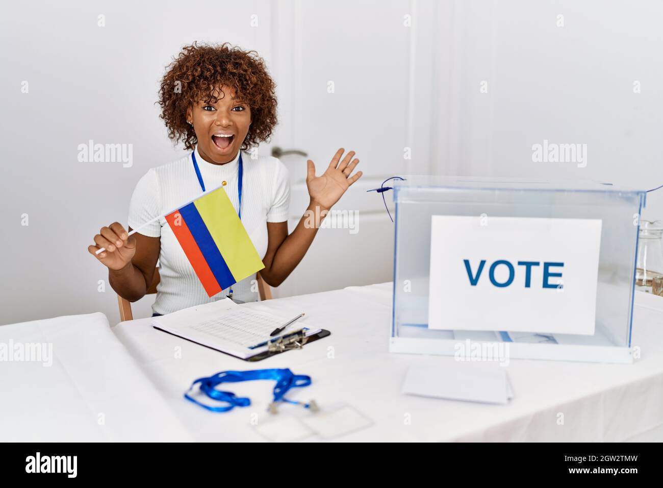 Young african american woman at political campaign election holding ...