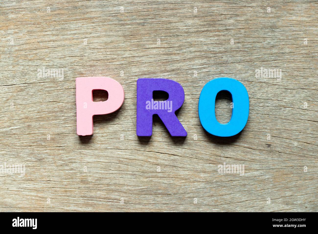Color alphabet letter in word pro on wood background Stock Photo - Alamy