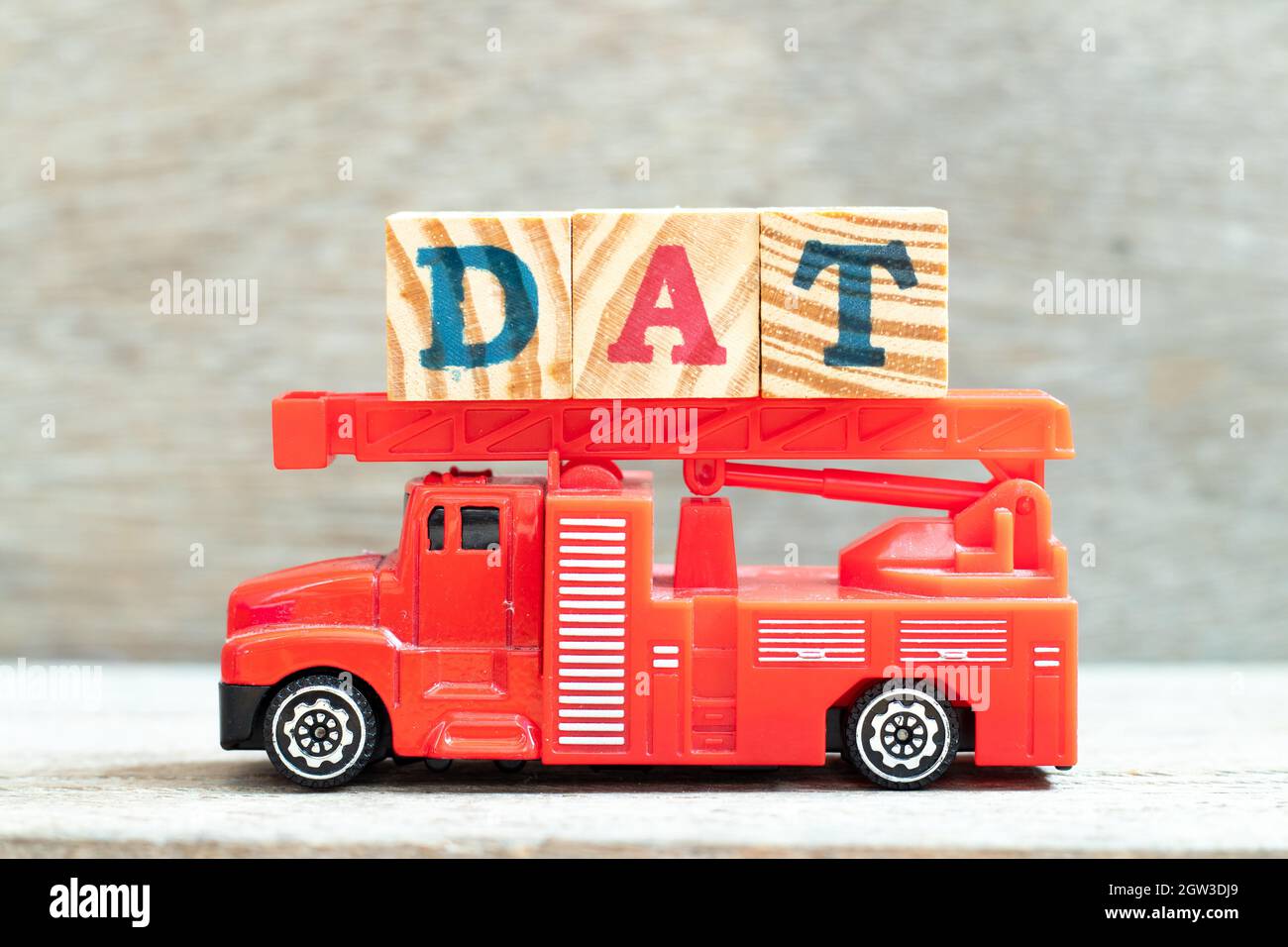 Fire ladder truck hold letter block in word DAT (Abbreviation of ...