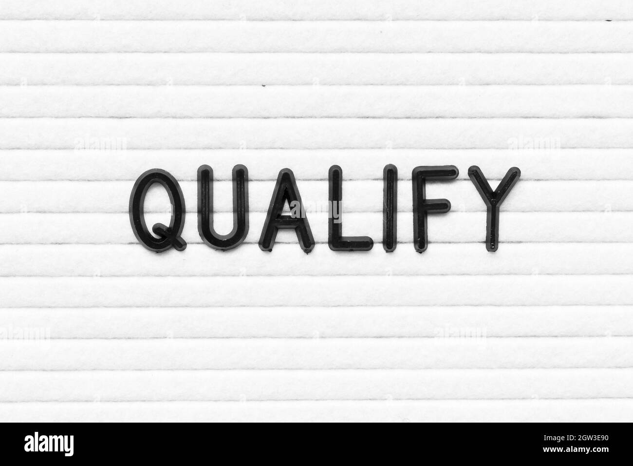 Black letter in word qualify on white felt board background Stock Photo ...