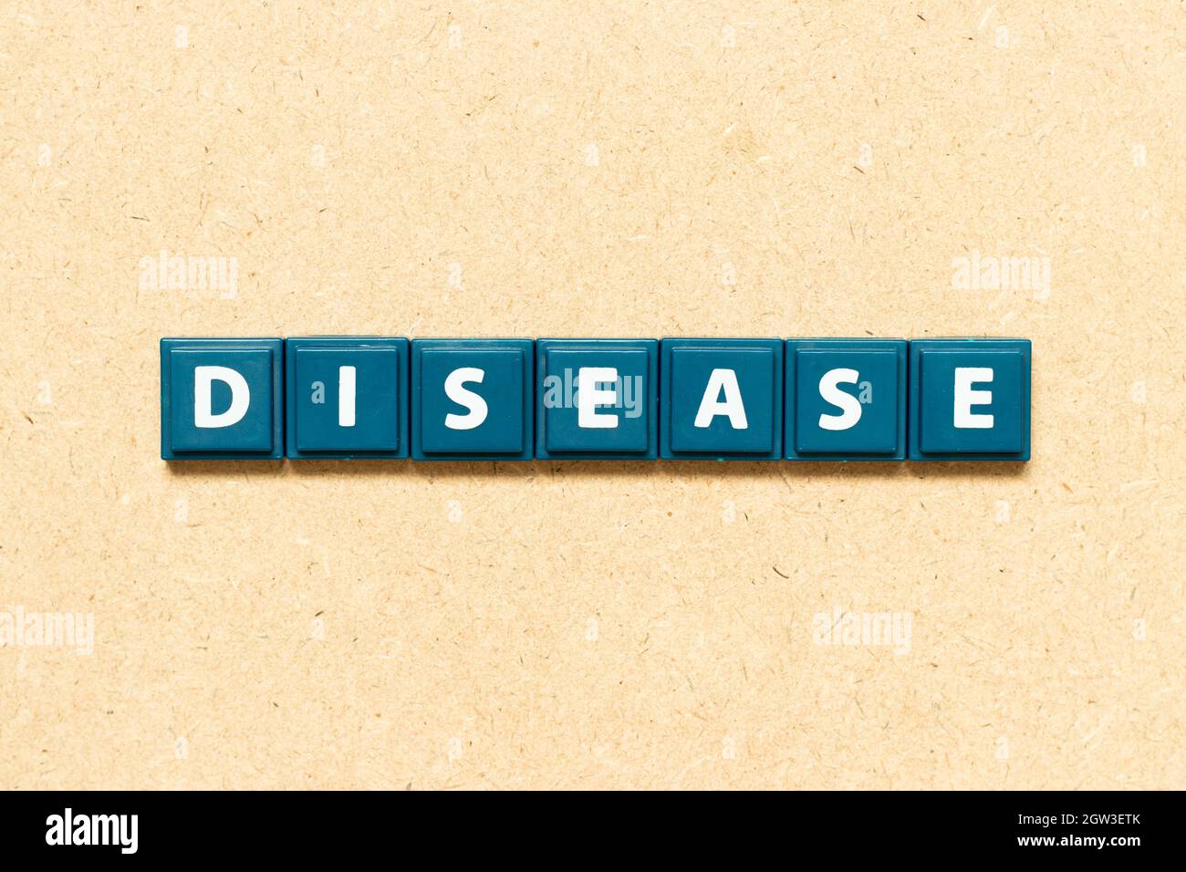 Tile alphabet letter in word disease on wood background Stock Photo - Alamy