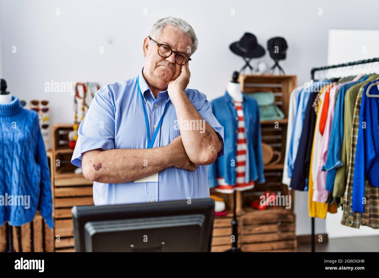 Bored shop assistant hi-res stock photography and images - Alamy