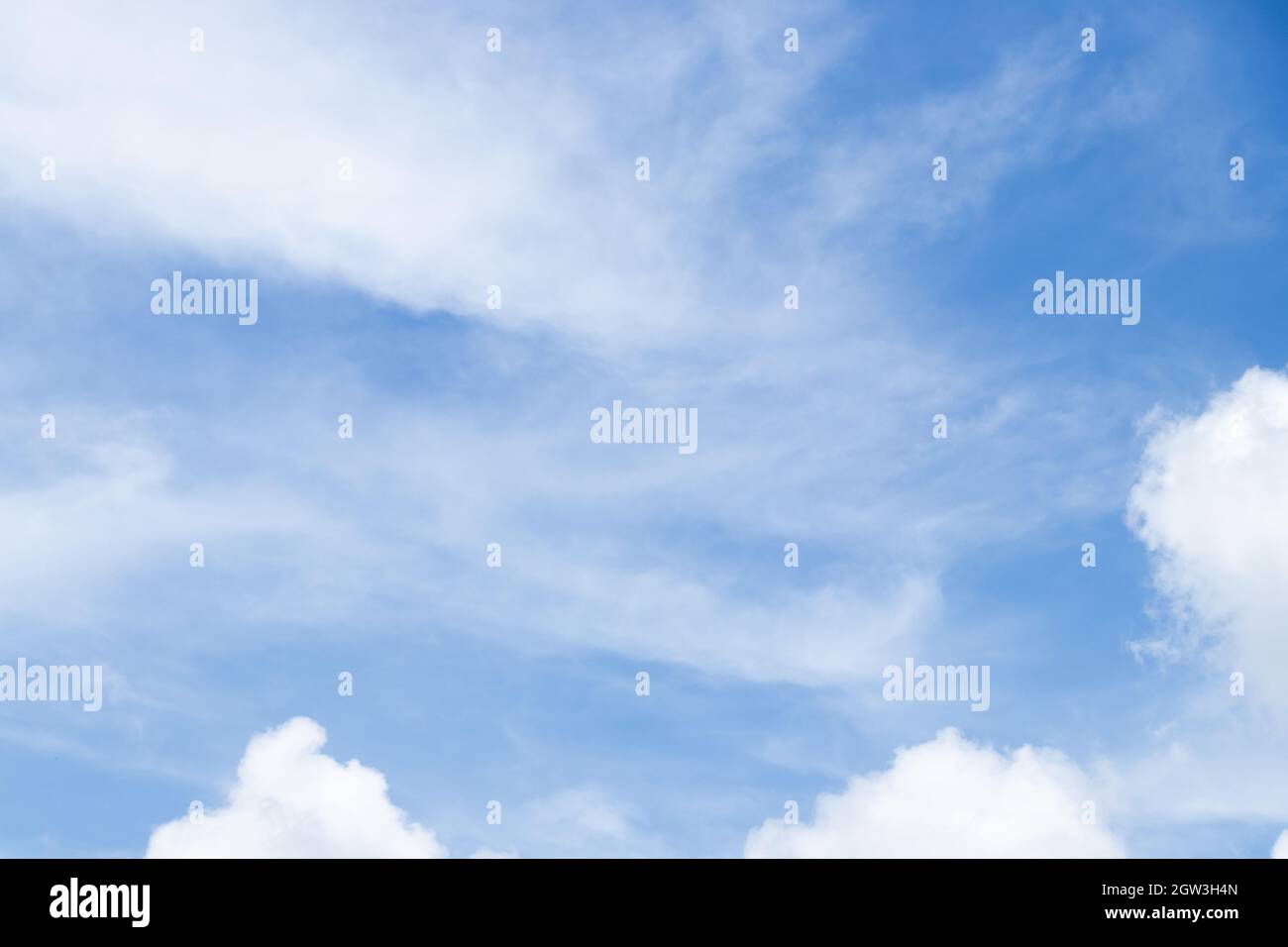 Clear blue color sky with white cloud background Stock Photo - Alamy
