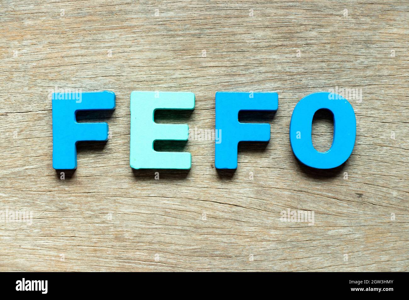 Color alphabet letter in word FEFO (Abbreviation of first expired first ...