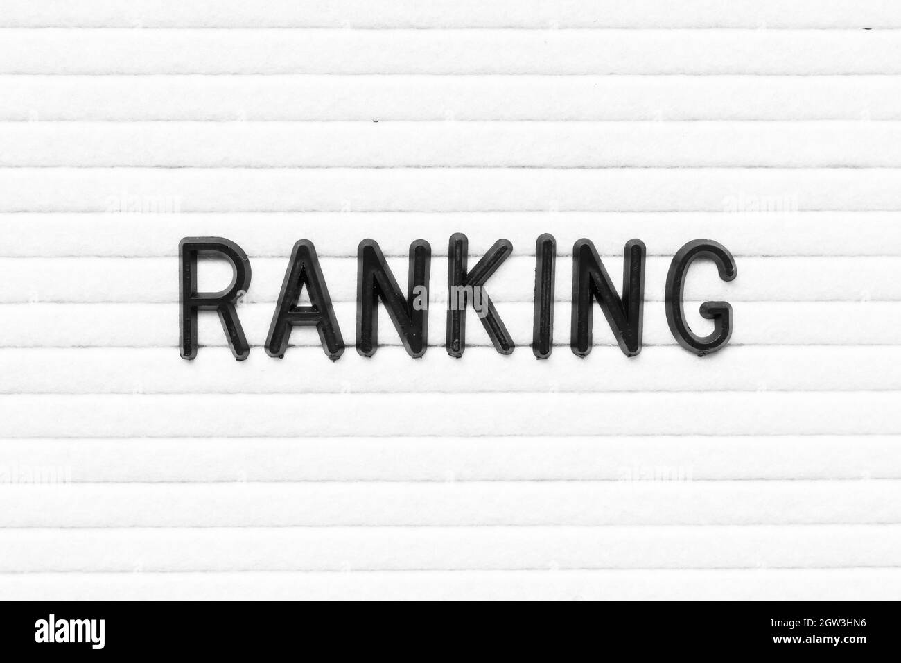 Black letter in word ranking on white felt board background Stock Photo ...