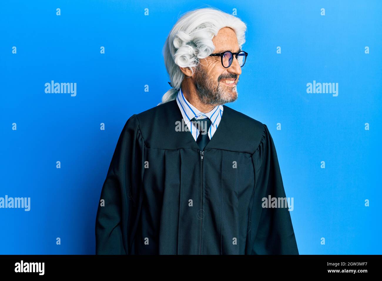 Looking away uniform authority smiling hi-res stock photography and ...