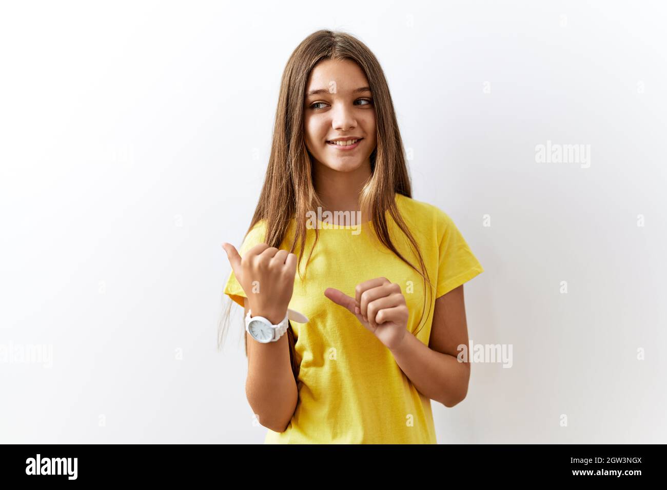Young brunette teenager standing together over isolated background ...