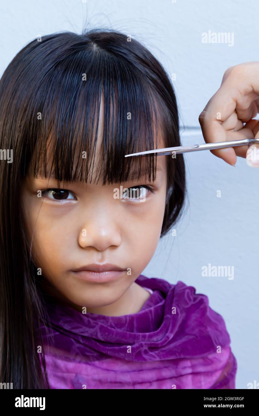 Cutting eyes up at camera hi-res stock photography and images - Alamy