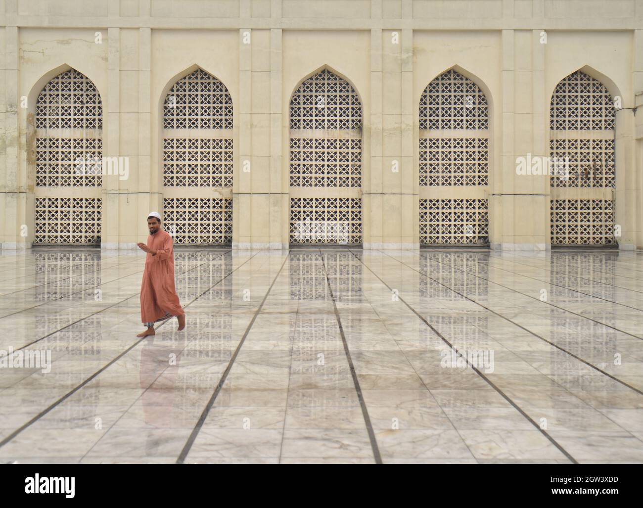 Full Length Of Man Walking On Floor In Mosque Stock Photo - Alamy