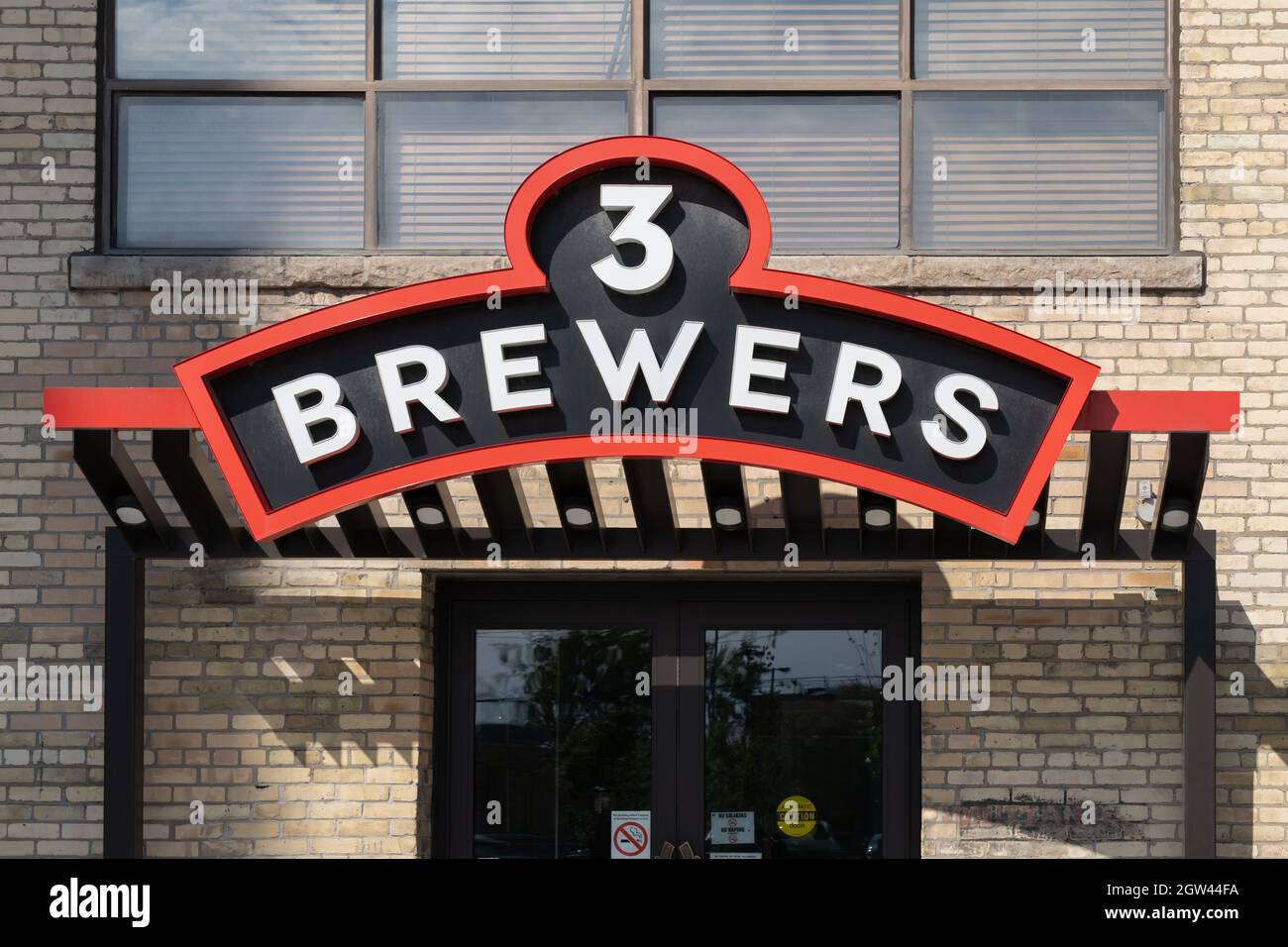 Toronto, Canada - October 2, 2021: Close up of 3 Brewers restaurant's ...