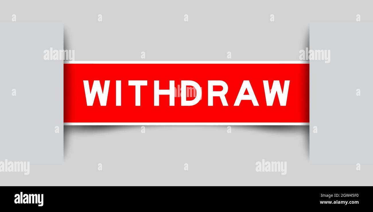 Inserted red color label sticker with word withdraw on gray background ...
