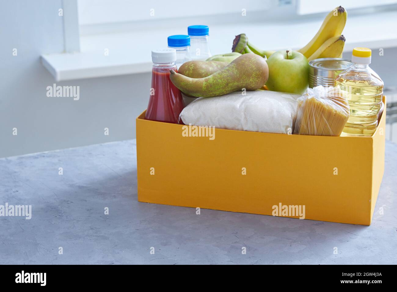 A Set Of Foods For Food In A Yellow Box. Copy Space On A Gray-blue ...