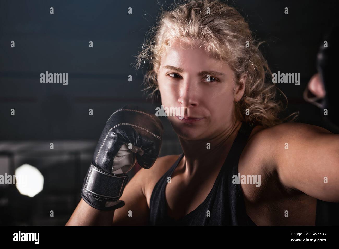 Blond boxing training woman gloves hi-res stock photography and images ...