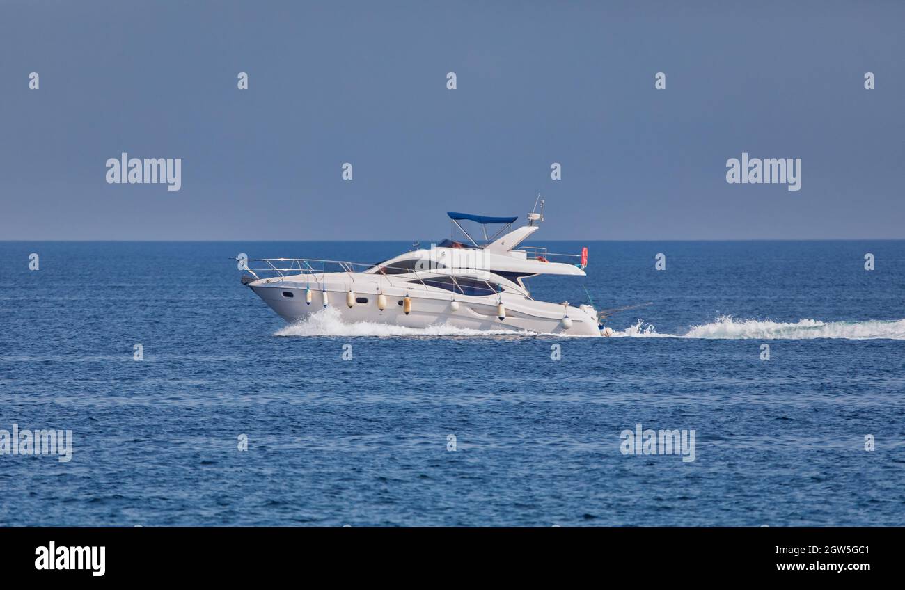 Modern expensive luxury yacht for private recreation floats on water ...