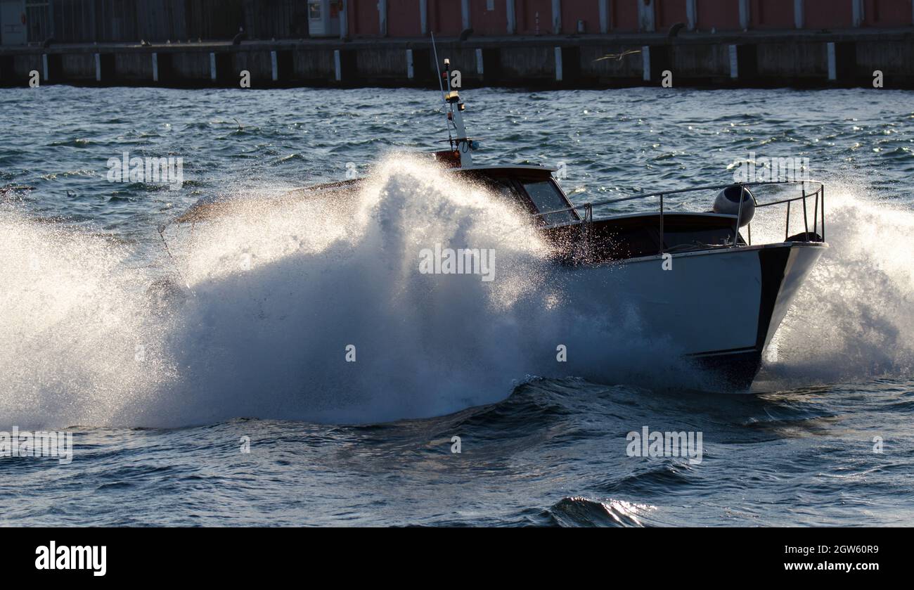 Wave hitting boat hi-res stock photography and images - Alamy