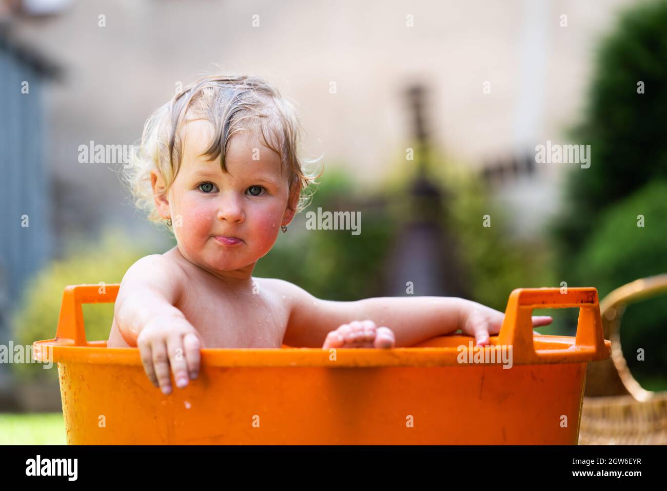 Baby in barrel hi-res stock photography and images - Alamy