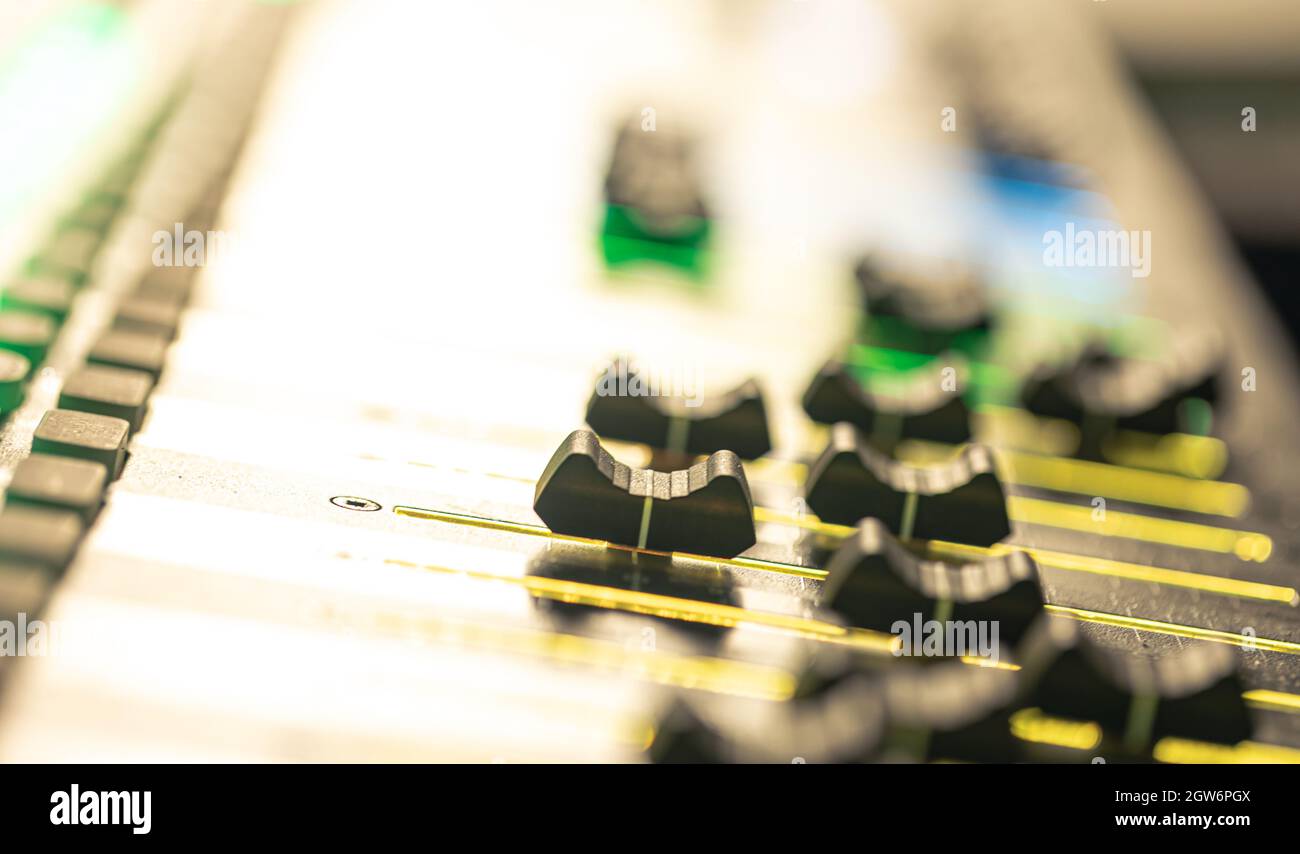 Sound mixer. Professional audio mixing console with lights, buttons ...