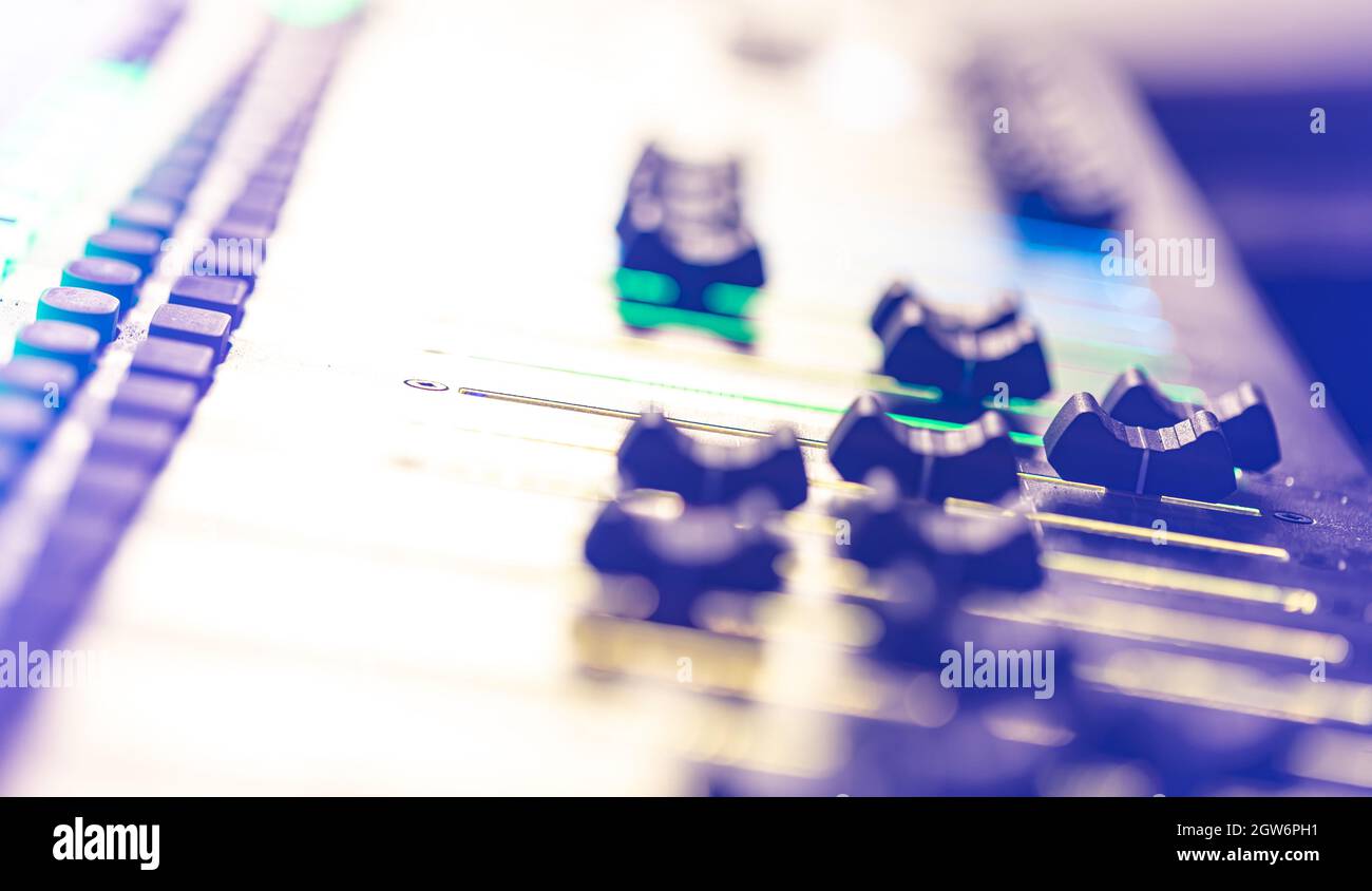 Sound mixer. Professional audio mixing console with lights, buttons ...