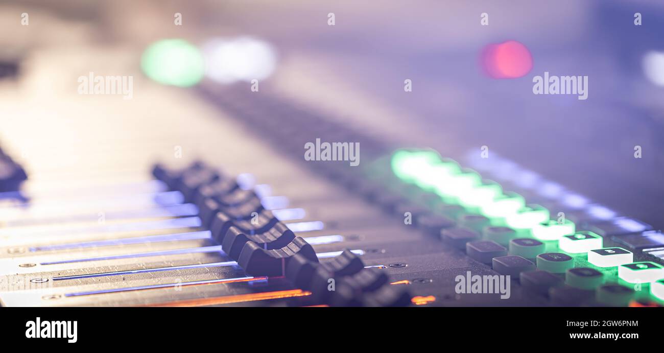 Sound mixer. Professional audio mixing console with lights, buttons ...