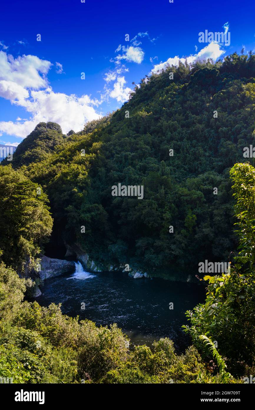 Waterfall of Bassin La Mer at Reunion Island during a sunny day Stock ...