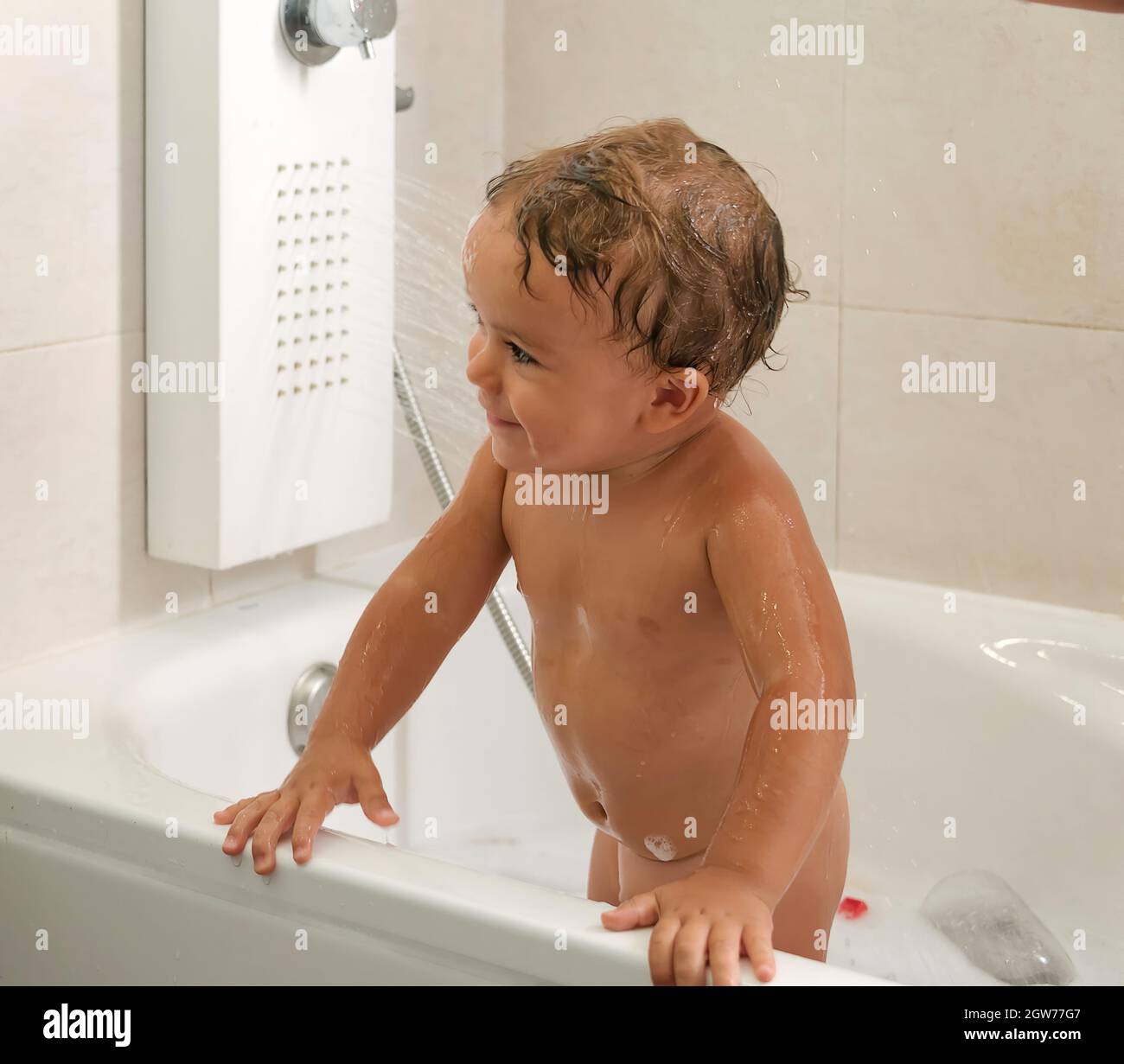 Boys playing in the tub hi-res stock photography and images - Alamy