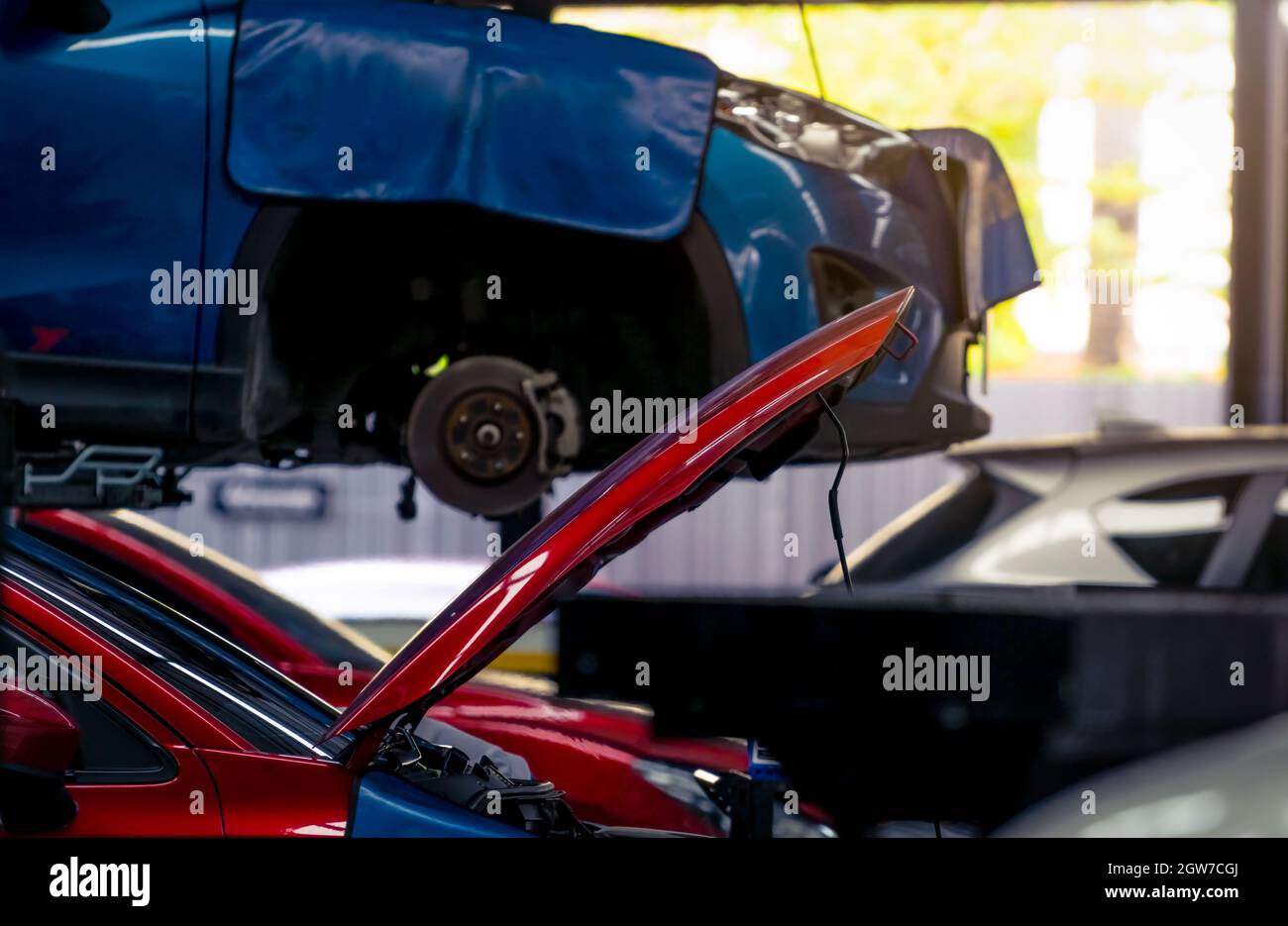 Car lifted hi-res stock photography and images - Alamy