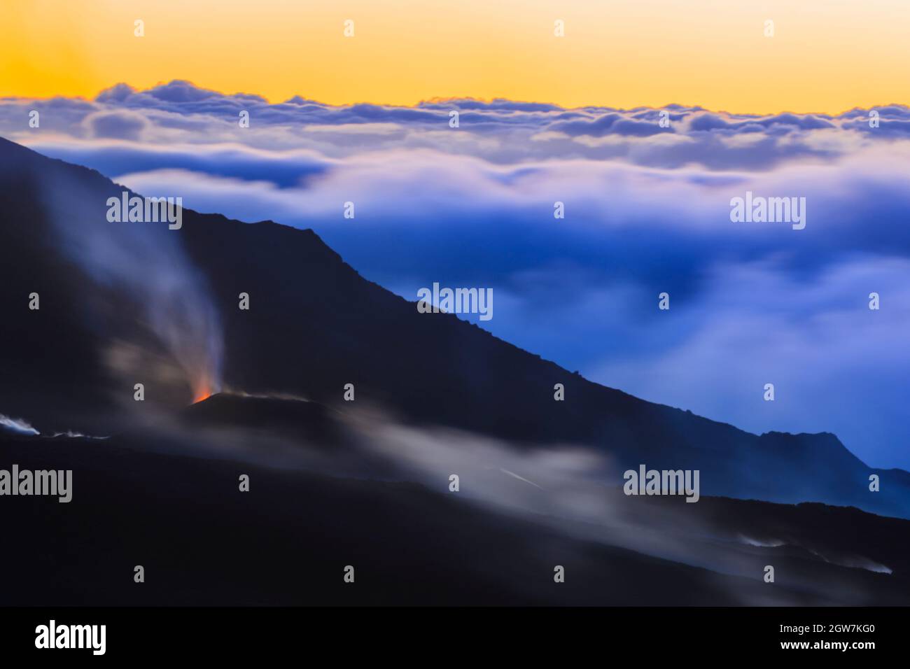 Volcanic eruption with sunrise colors at Reunion Island Stock Photo - Alamy