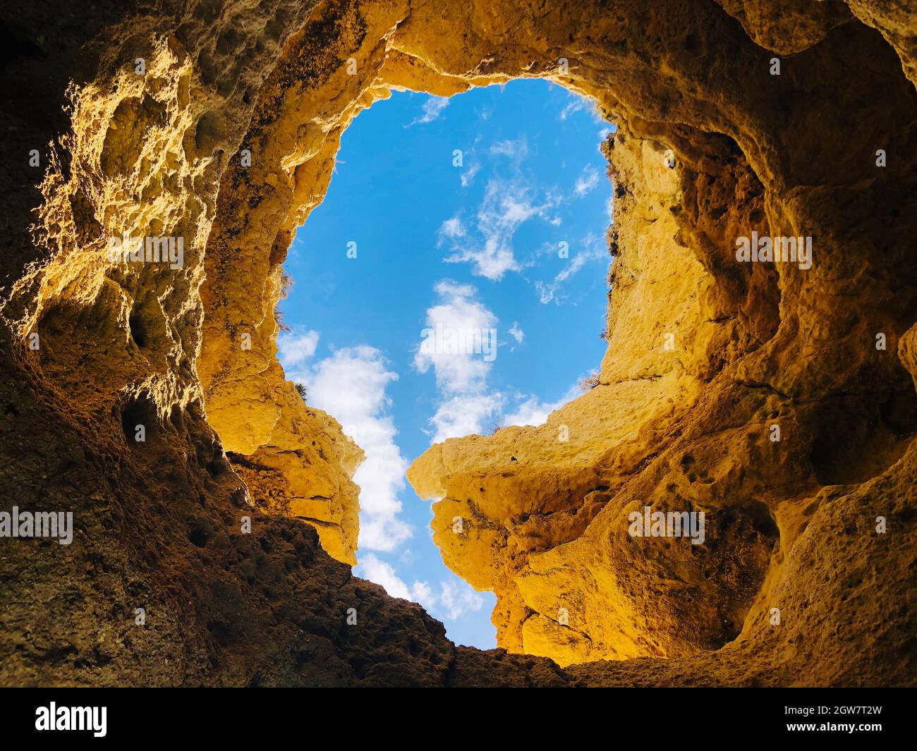 Limestone cave with blue sky and clouds hi-res stock photography and ...