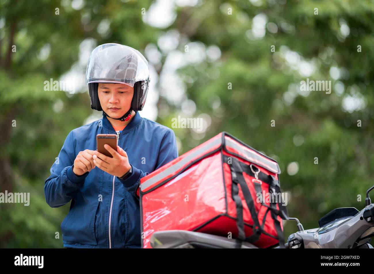 Indian delivery boy on bike hi-res stock photography and images - Alamy