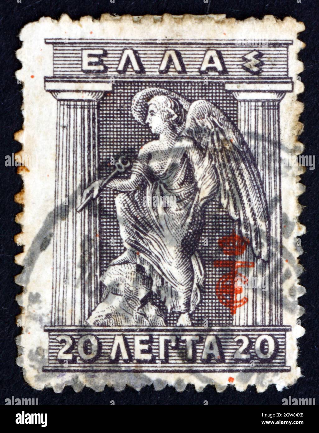 GREECE - CIRCA 1913: a stamp printed in the Greece shows Iris Holding ...