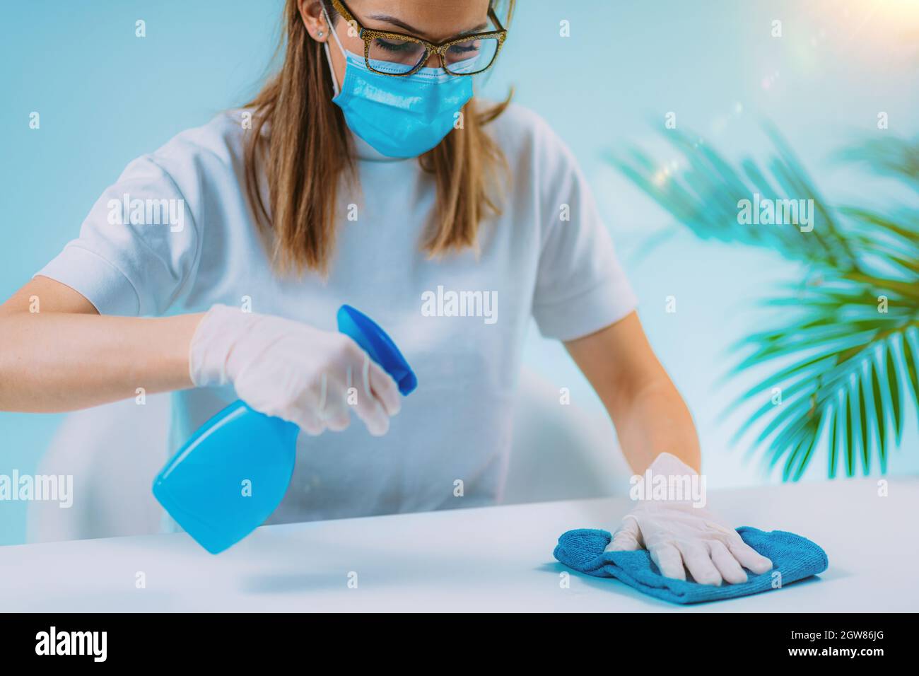 Wiping a surface with disinfectant High Resolution Stock Photography ...