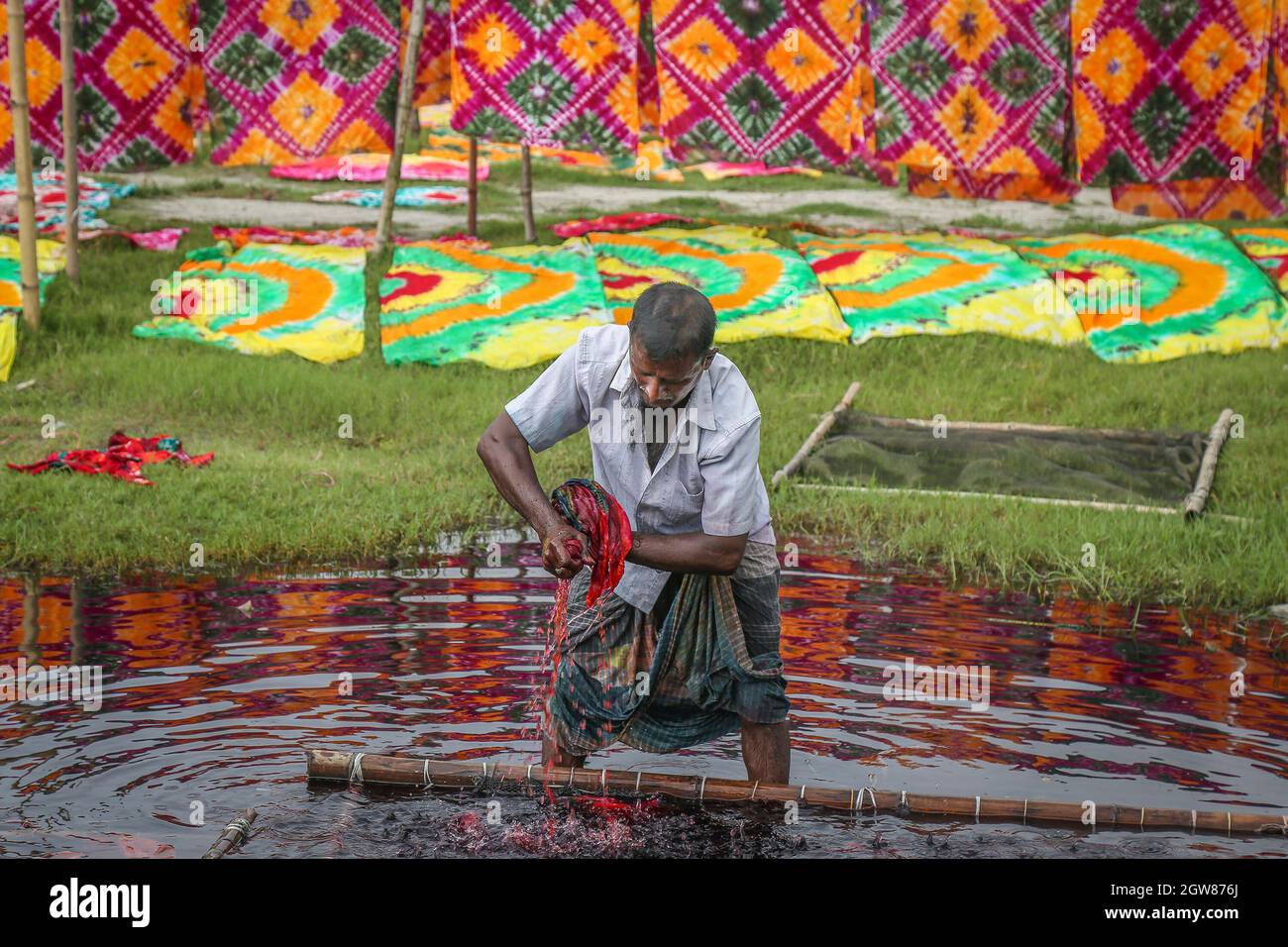 Cloth dyeing and drying Stock Photo - Alamy