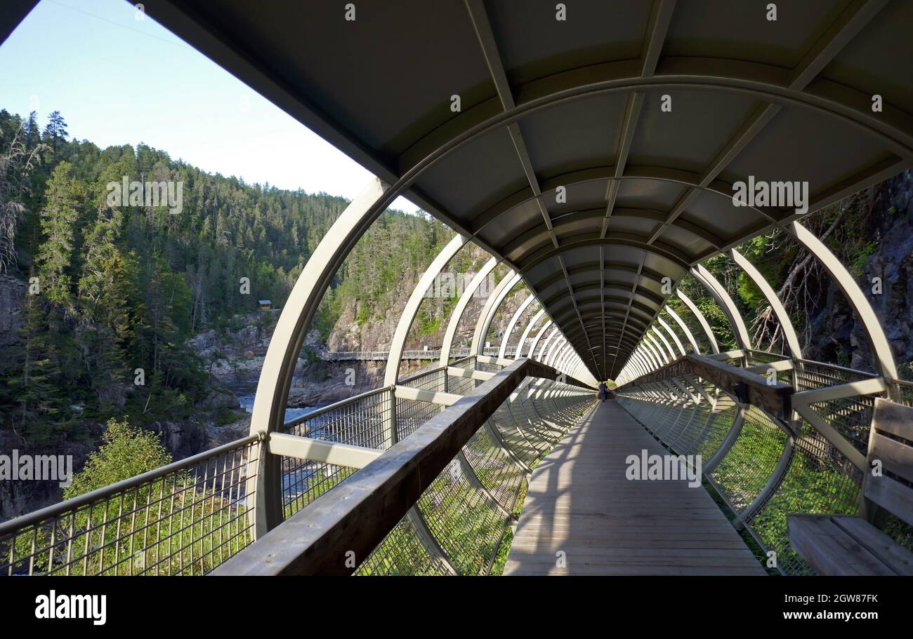 Futuristic Walkway Along A Wild River Stock Photo - Alamy