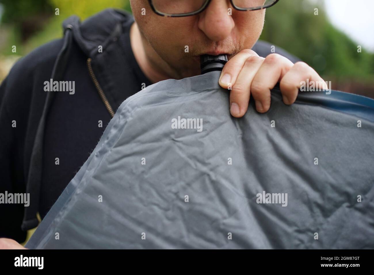 Blowing Up Inflatable High Resolution Stock Photography and Images - Alamy
