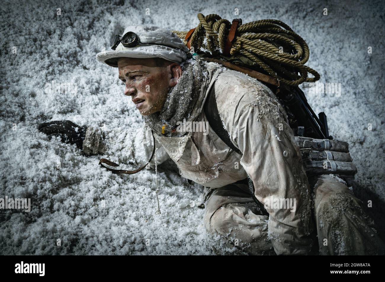 Injured German soldier lying on snow. WWII historical diorama titled ...