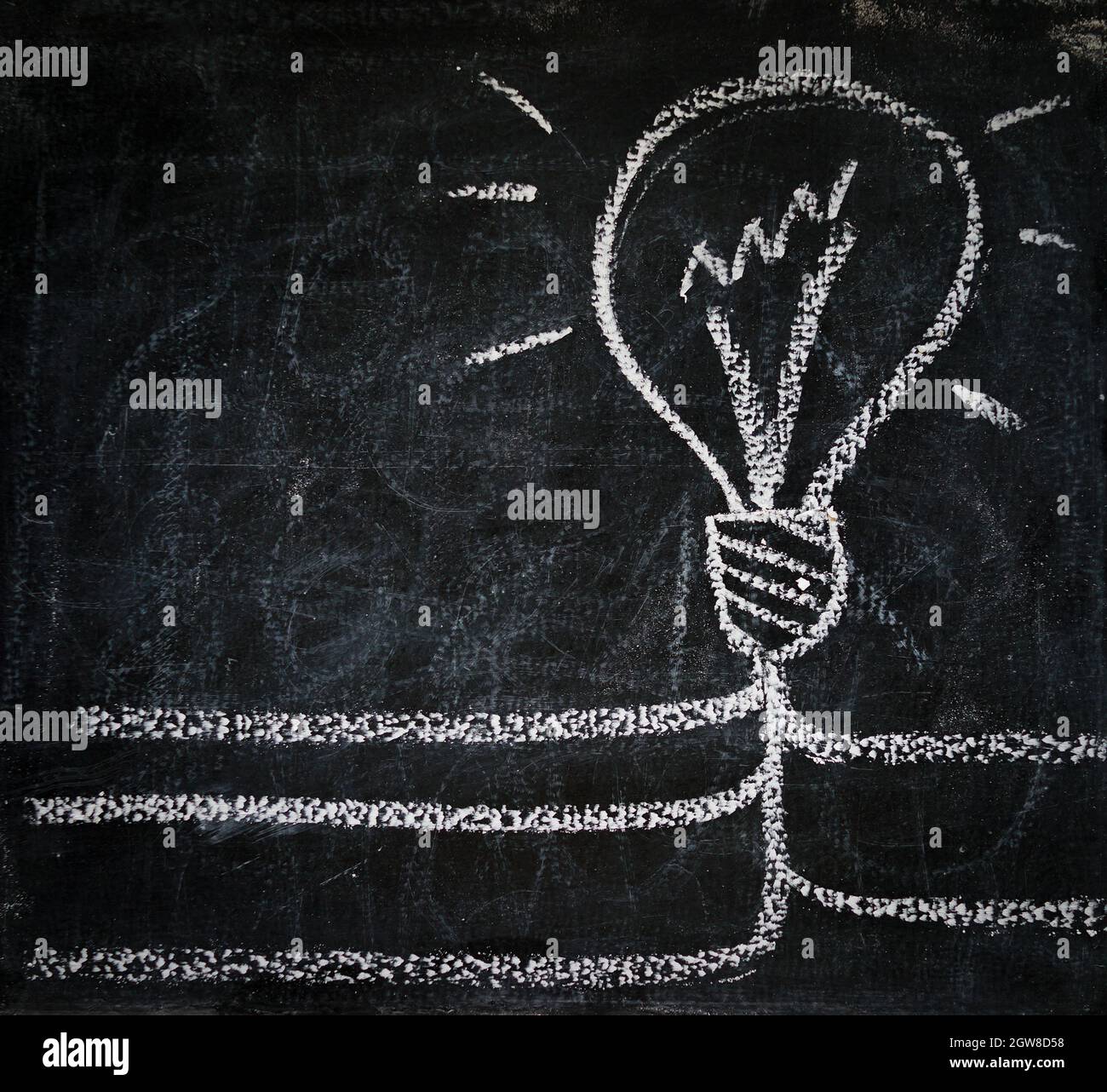 Smart bulb of best idea solution on board Stock Photo - Alamy