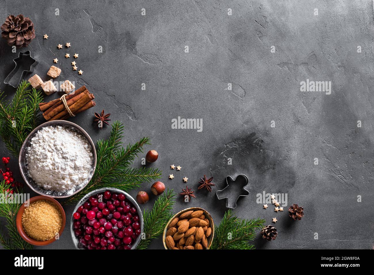 Christmas baking background with cranberris, nuts, food ingredients and ...