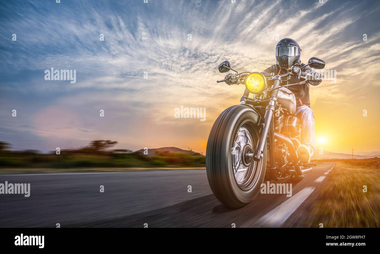 Biker riding motorcycle low angle hi-res stock photography and images ...