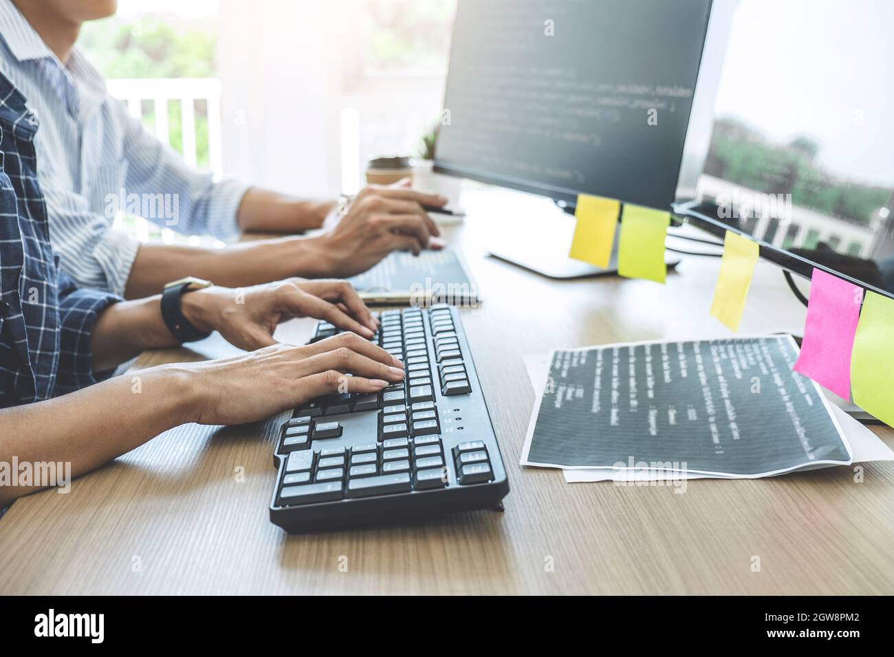 Coder typing programming language hi-res stock photography and images - Alamy