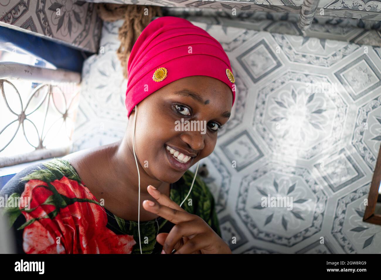 Beautiful African young woman traveling in small bus Stock Photo - Alamy